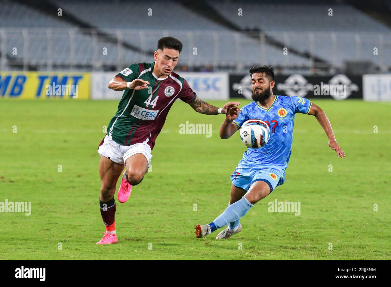 Kolkata, India. 22nd Aug, 2023. Ashish Rai (No 44) (L) of Mohun Bagan ...