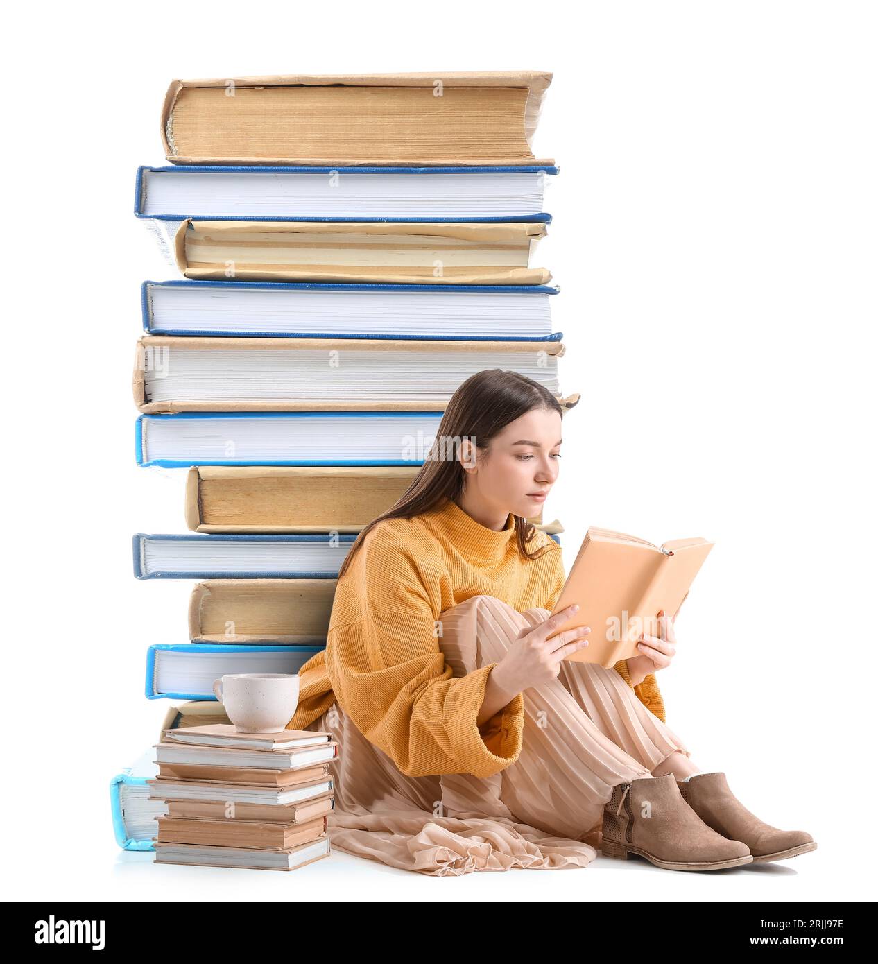 Young reading woman and many big stacked books on white background ...