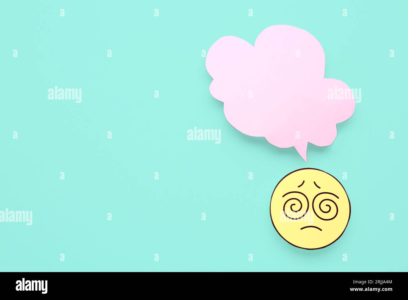 Confused paper face with blank speech bubble on turquoise background ...