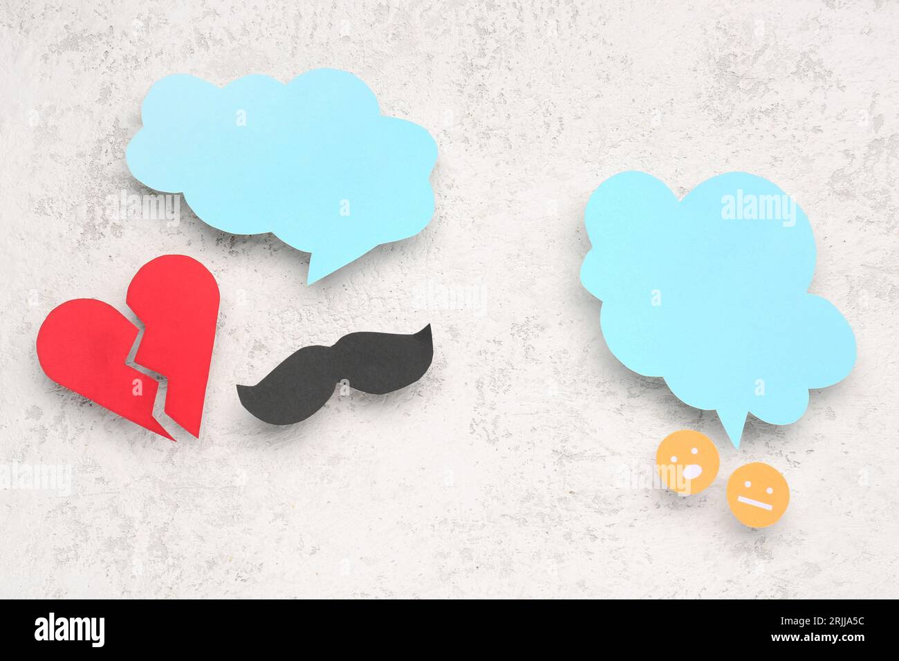 Paper faces, mustache and broken heart with blank speech bubbles on light background Stock Photo ...
