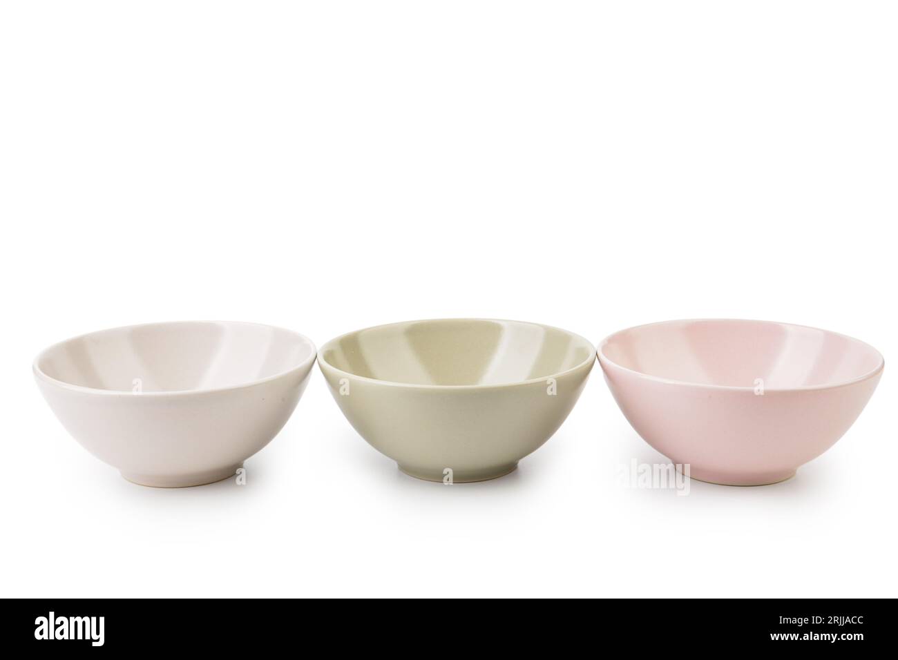 Set of color bowls on white background Stock Photo - Alamy