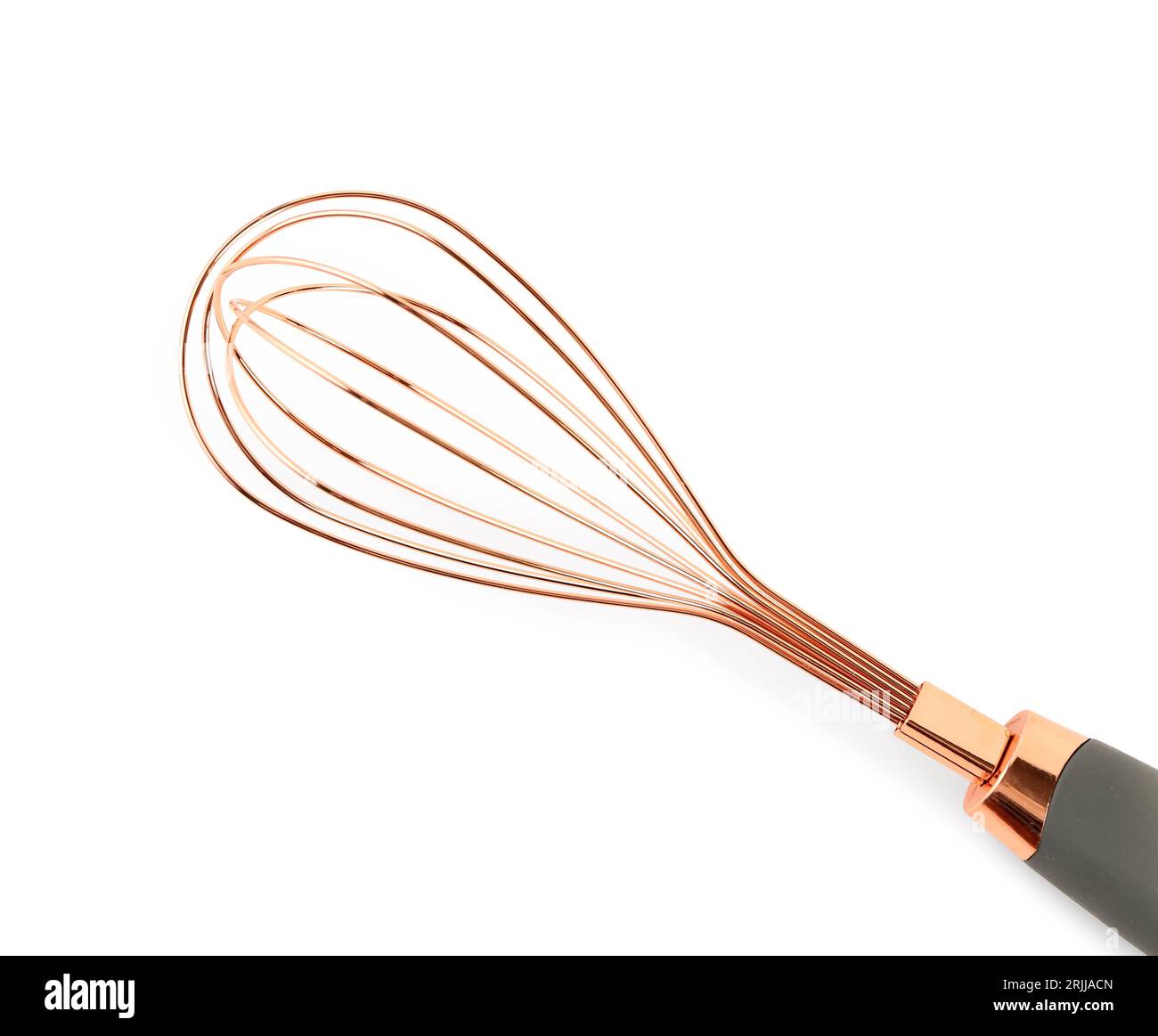 Stainless steel whisk on white background Stock Photo - Alamy