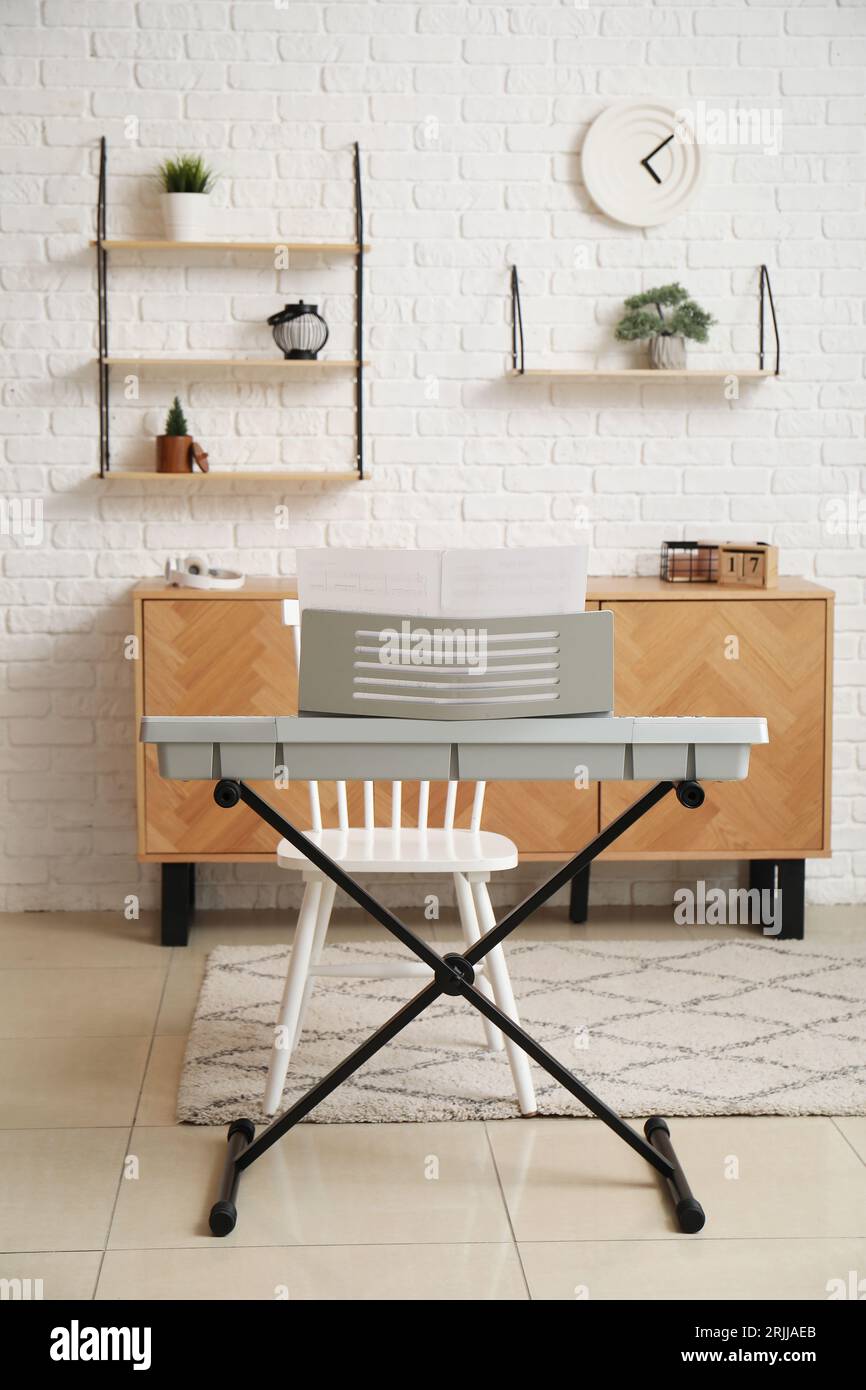 Interior of modern room with synthesizer Stock Photo - Alamy