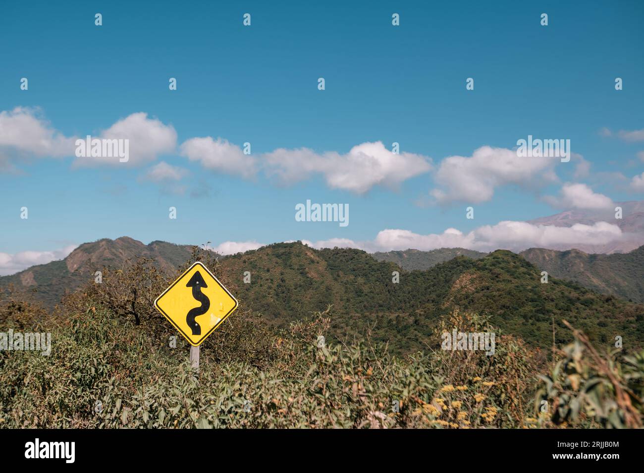 Curvy signpost on the Los Lagos trails in the Potrero de Yala ...