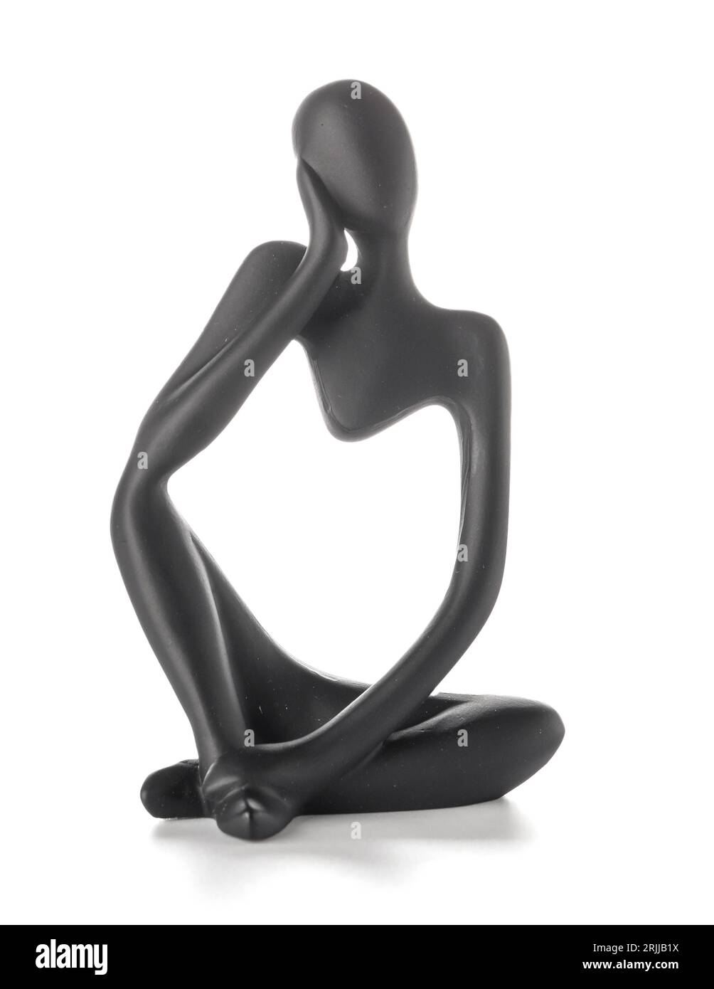 Black statuette in form of woman body on white background Stock Photo ...