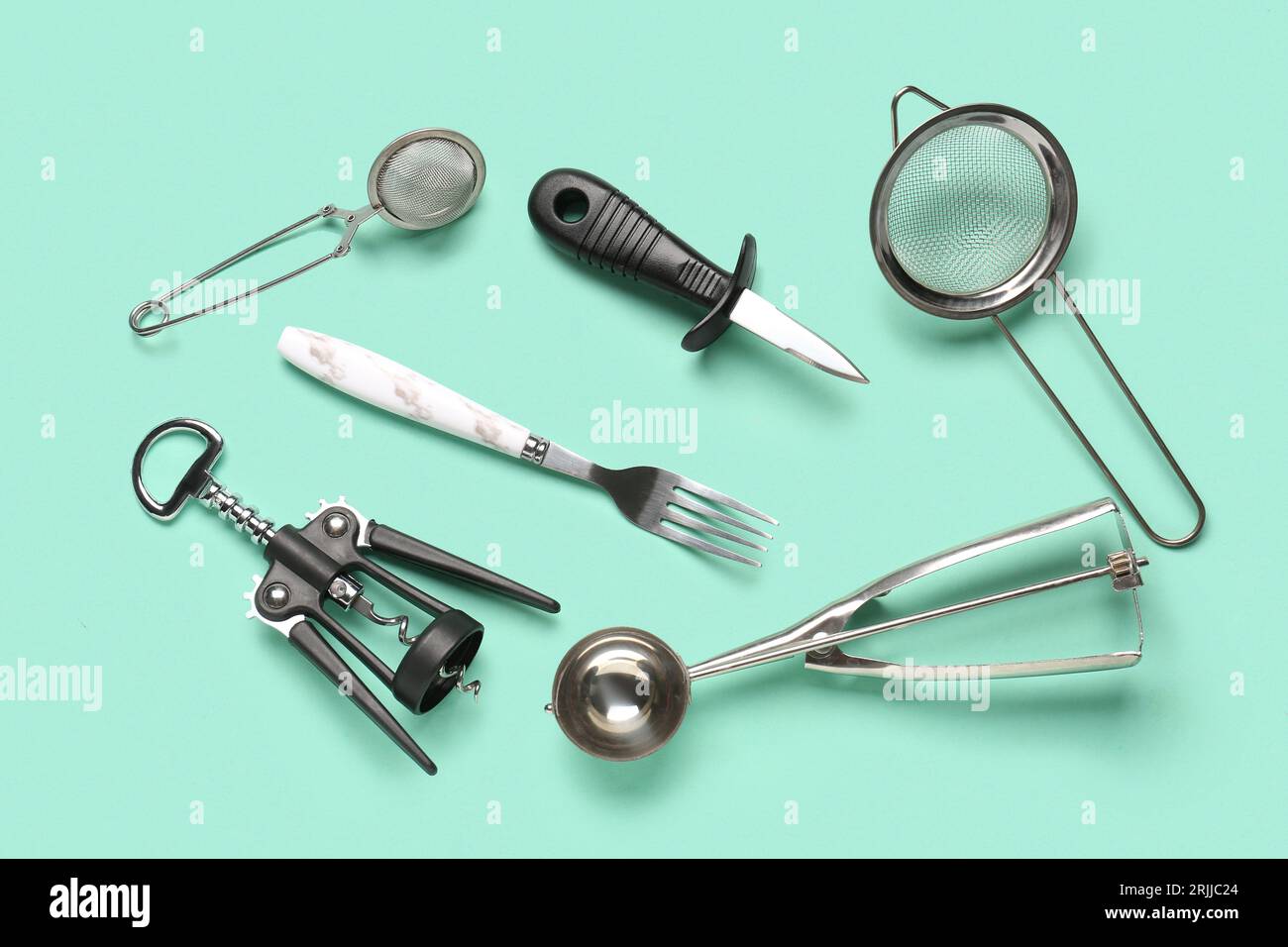 Set of kitchen utensils on turquoise background Stock Photo - Alamy