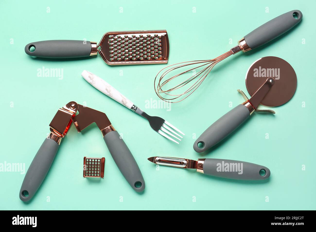 Set of kitchen utensils on turquoise background Stock Photo - Alamy