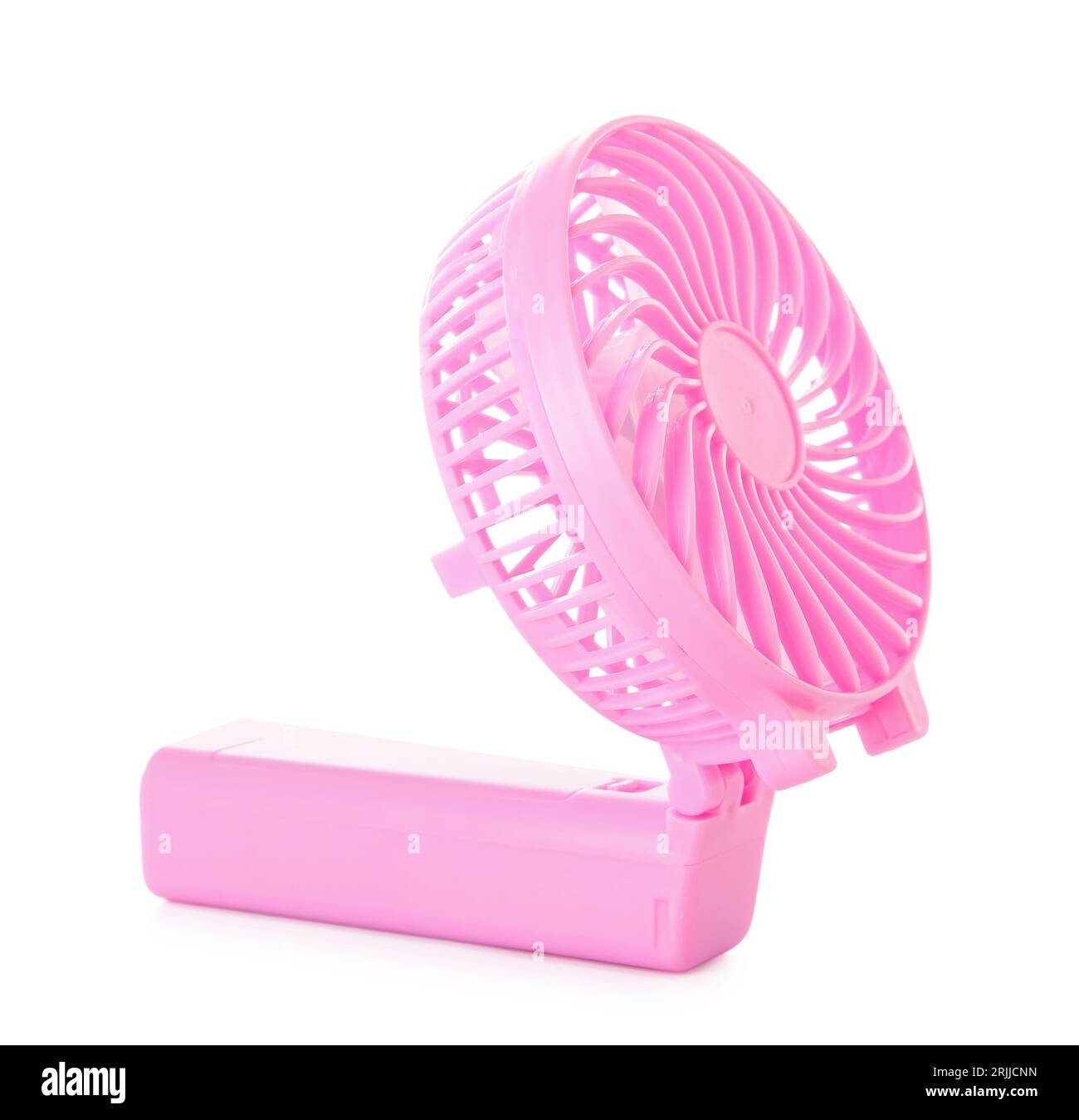 Small pink electric fan on white background Stock Photo - Alamy