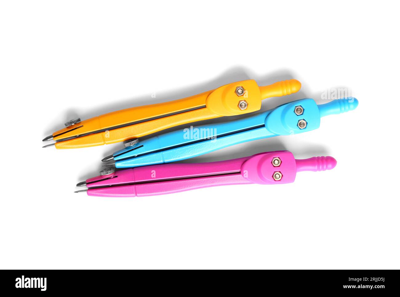 Colorful compasses on white background Stock Photo - Alamy
