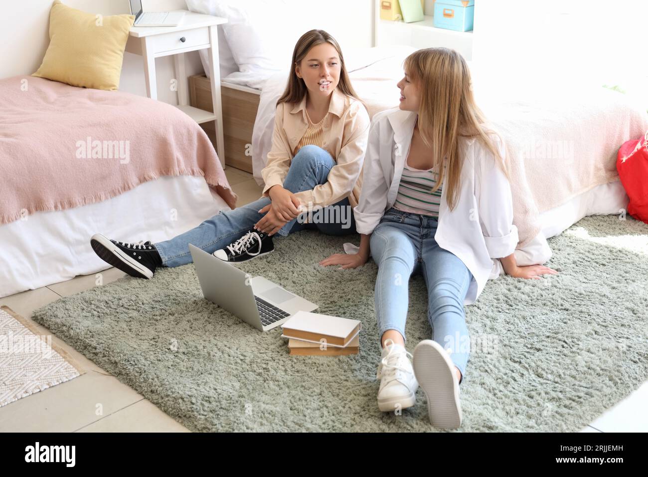 Female students studying in dorm room Stock Photo - Alamy