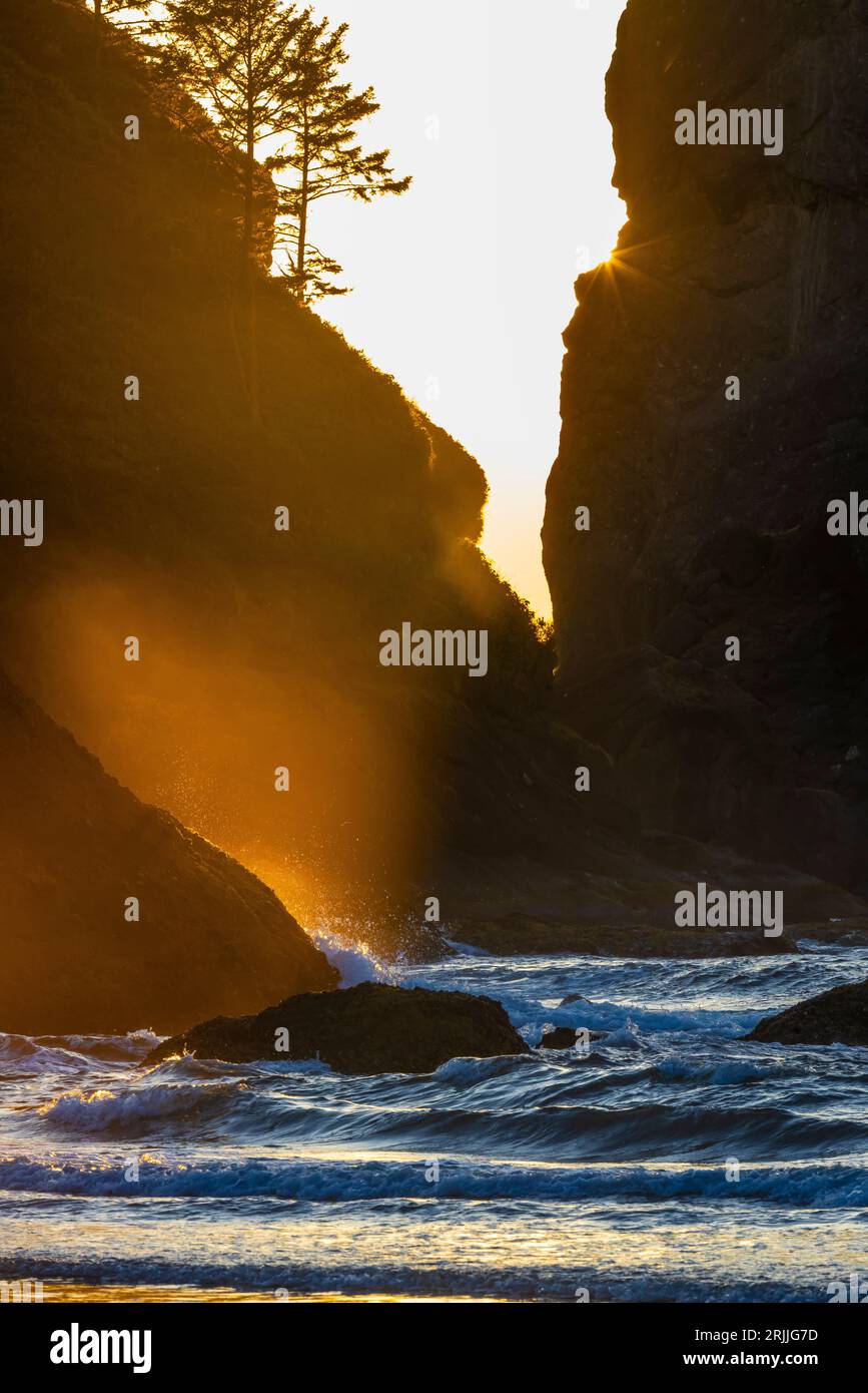 Sunset glow painting the sea spray mist at Point of Arches, Olympic ...