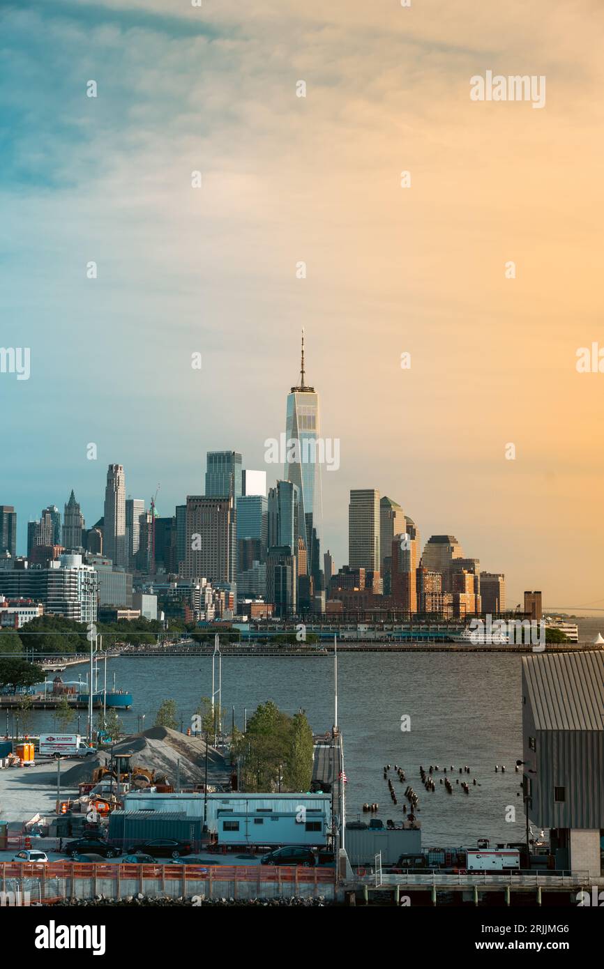 Aerial view of New York city skyline with a boat in the water Stock ...