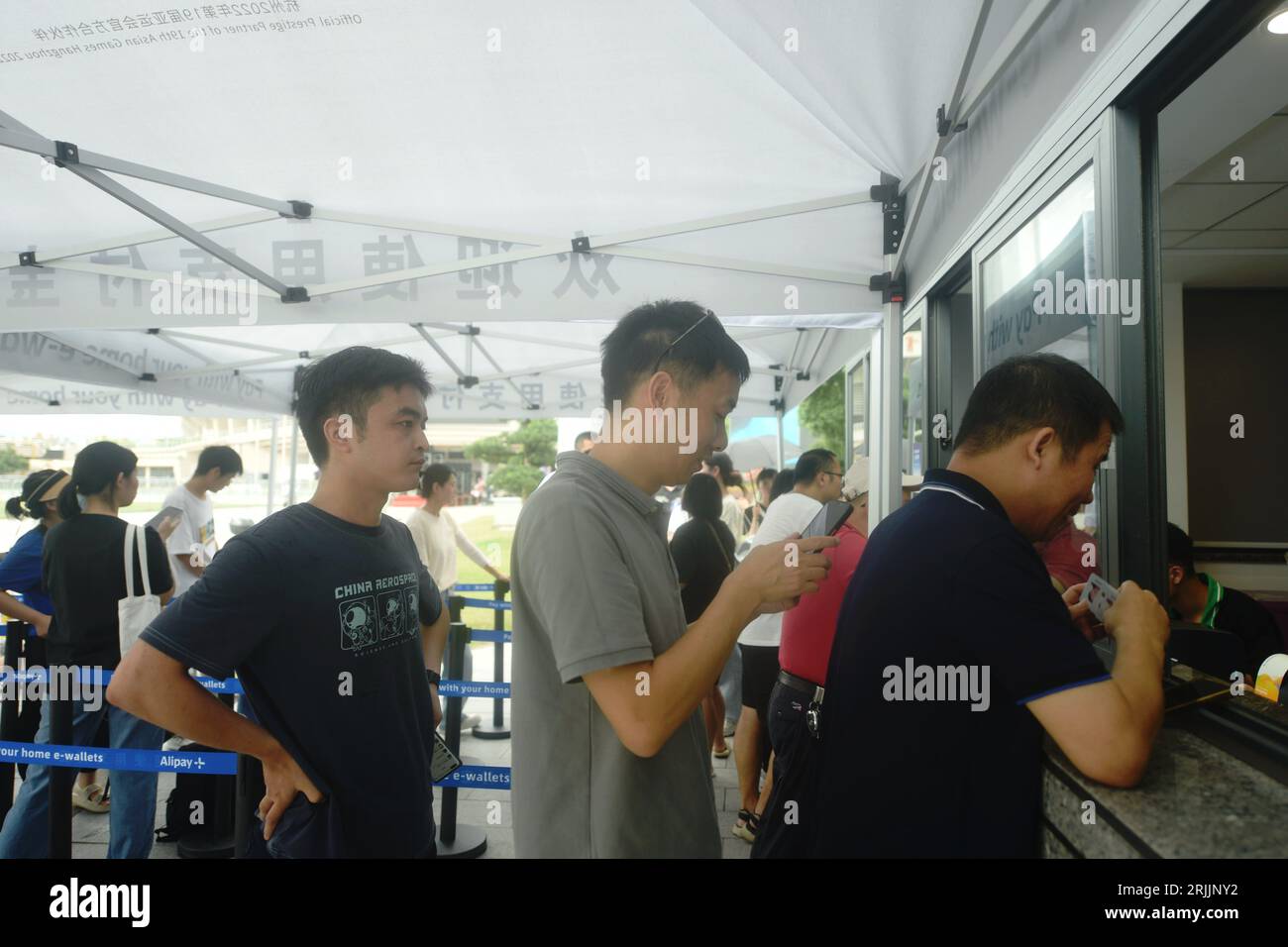 HANGZHOU, CHINA - AUGUST 23, 2023 - Spectators line up to buy tickets ...