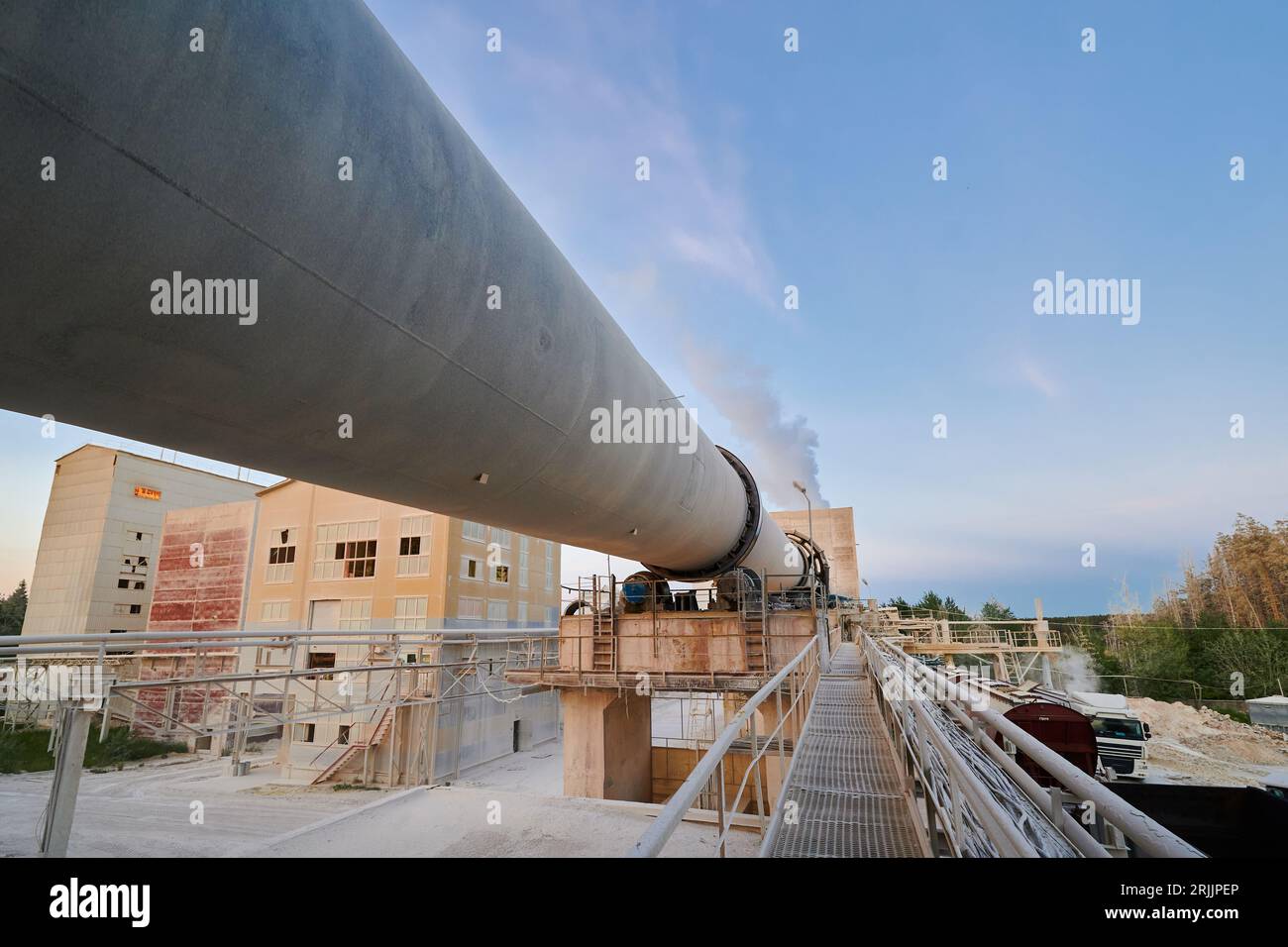 Tubular rotary furnace for limestone roasting in evening Stock Photo ...