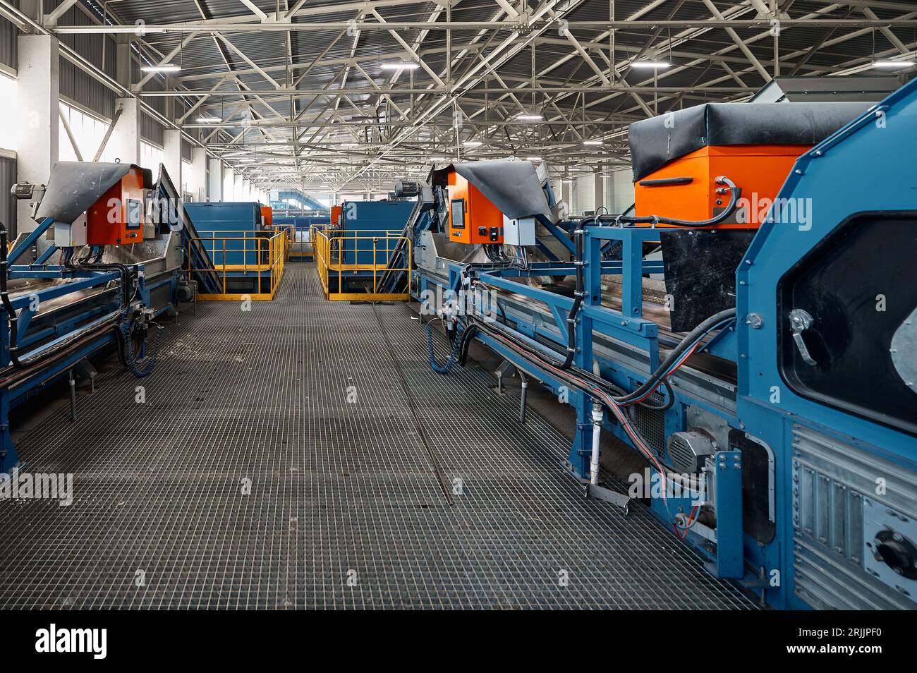 Production line with conveyors at waste recycling plant Stock Photo - Alamy