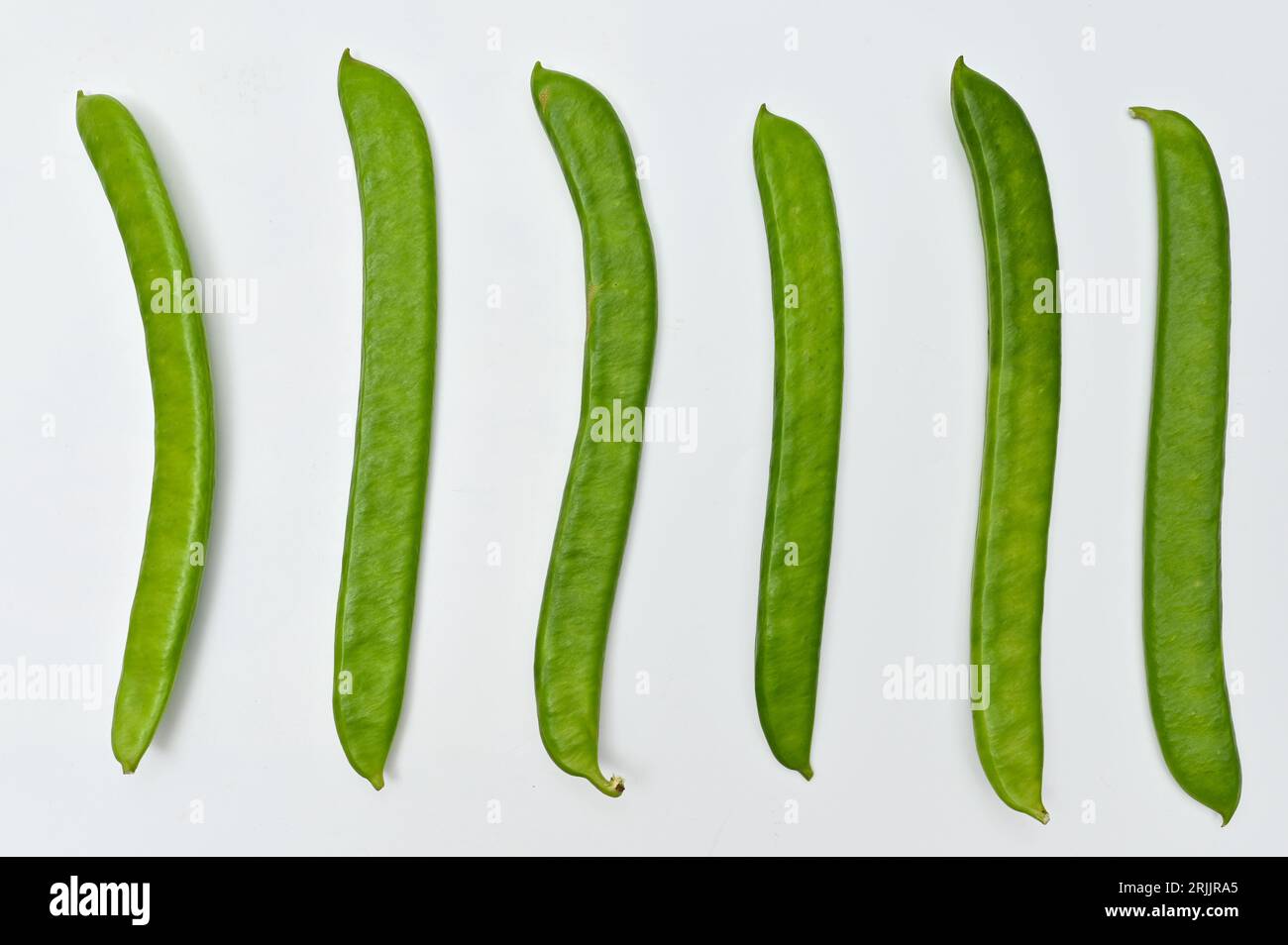 Sword beans with fresh vegetables on white background Stock Photo - Alamy