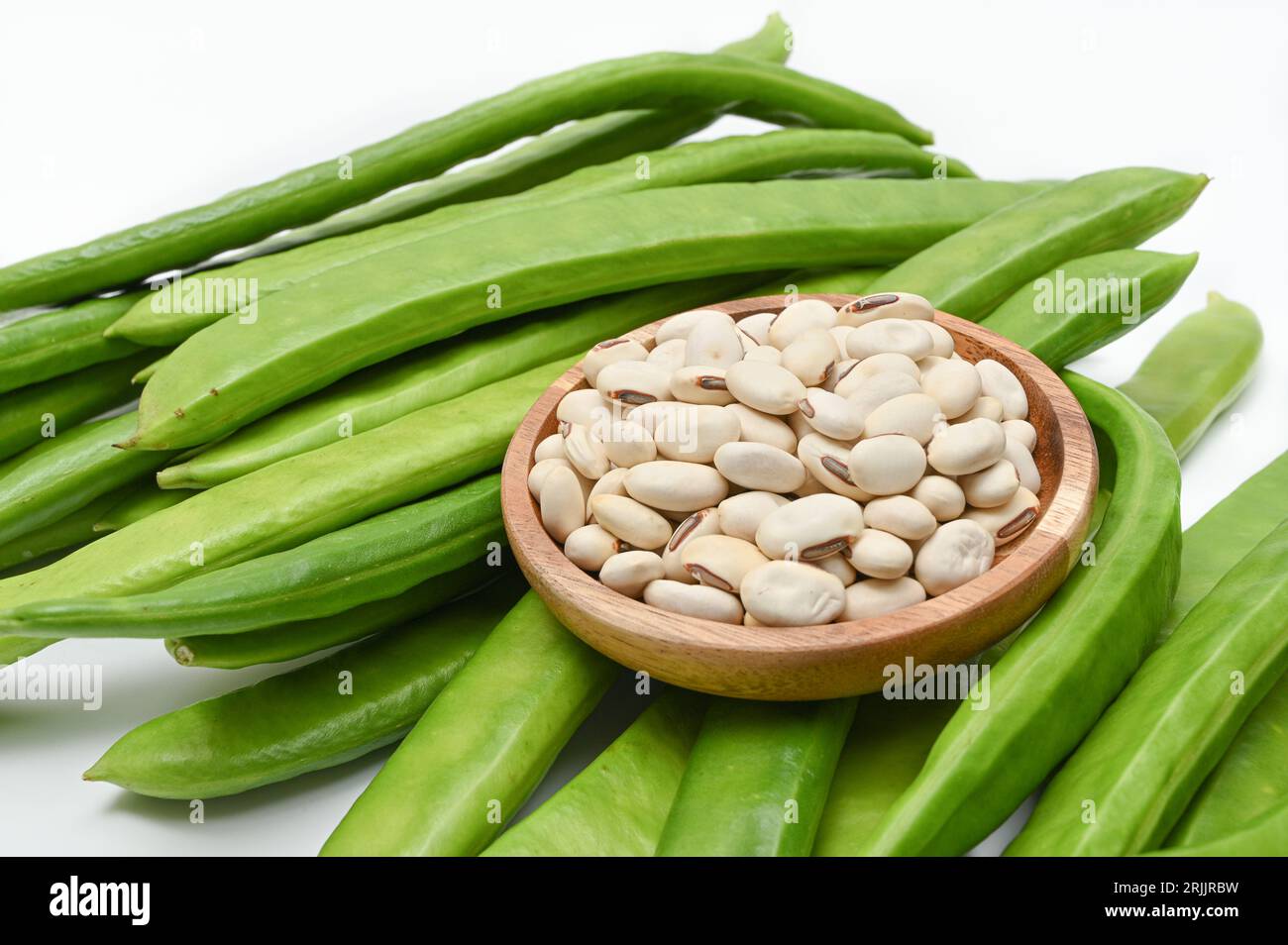 Sword beans with fresh vegetables on white background Stock Photo - Alamy