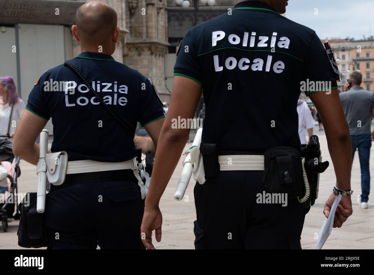 Milan , Italy - 08 17 2023 : polizia locale policeman in street police ...