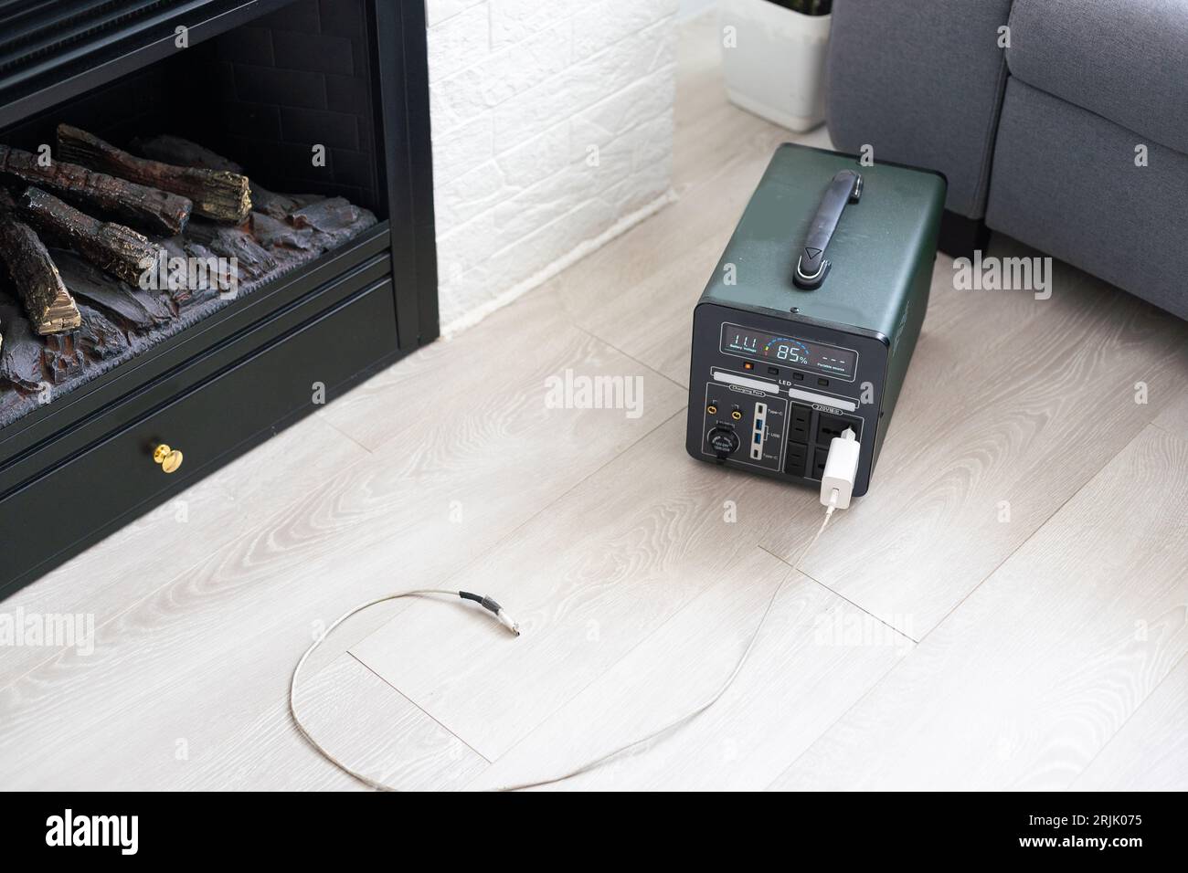 Portable Power Station is charging gadgets. Modern, information ...