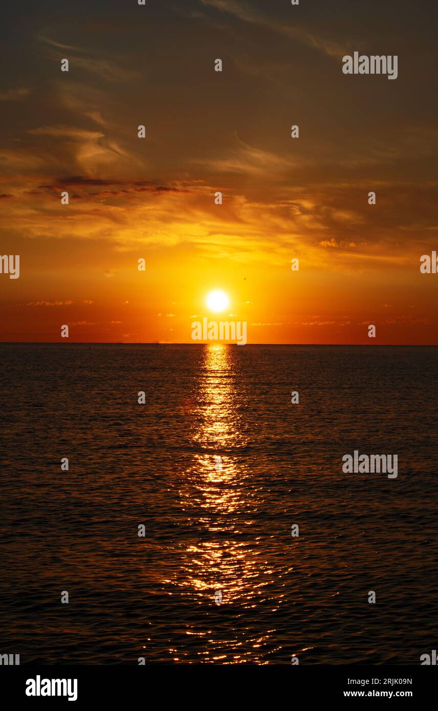 sunset over the sea Stock Photo - Alamy