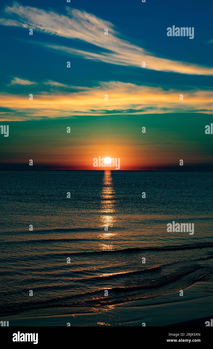 sunset over the sea Stock Photo - Alamy