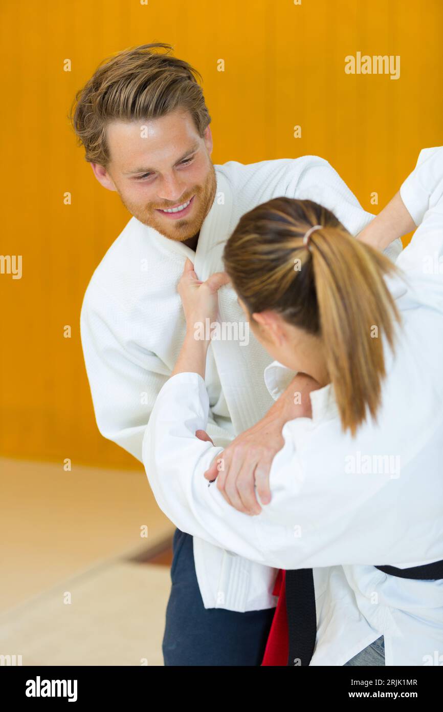men and women fighting in karate class Stock Photo - Alamy