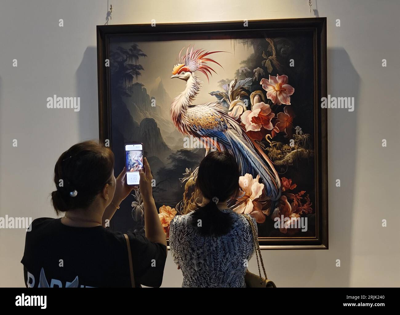 People visit the China Optics Valley AI Art Exhibition in Wuhan City ...