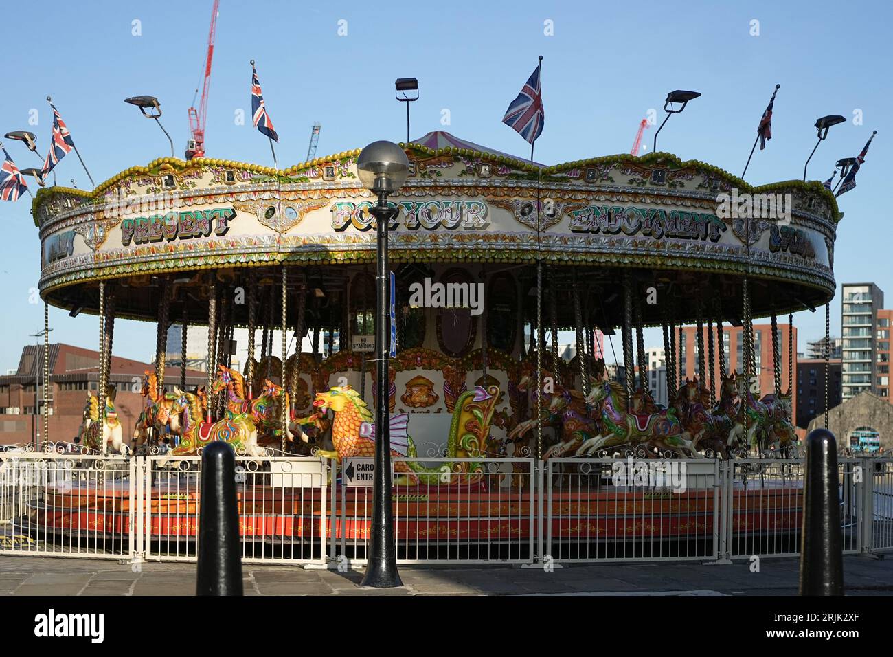 A children's funfair roundabout or carousel in the Albert Dock ...