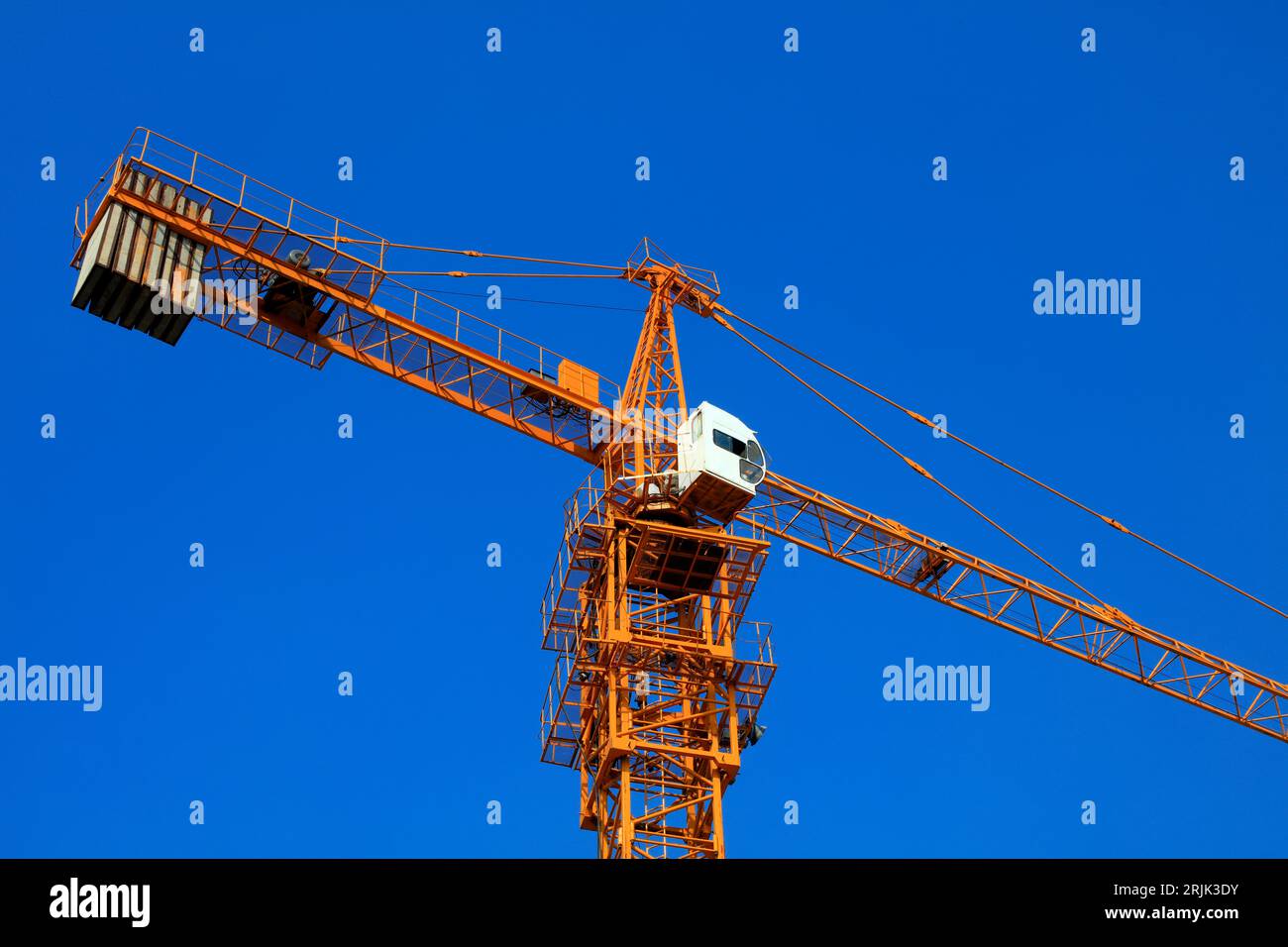 The tower crane is on the construction site Stock Photo - Alamy