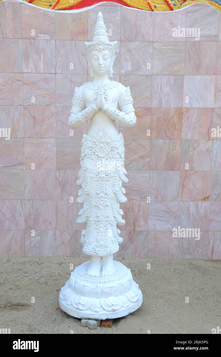 Carved sculpture art deity statue or angel figure lanna style for thai ...