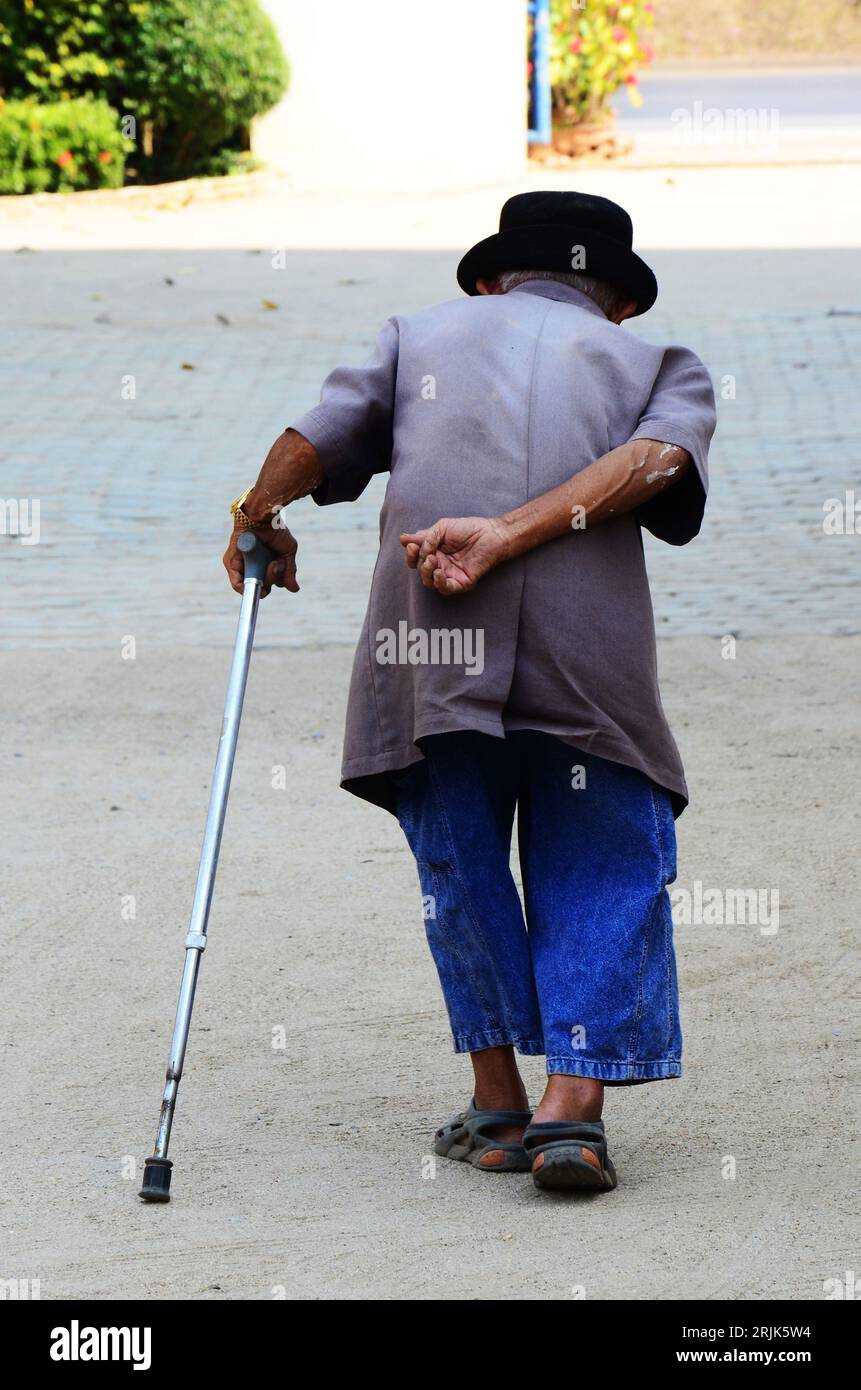 Life and lifestyle of old thai men people use staff stick walking relax ...