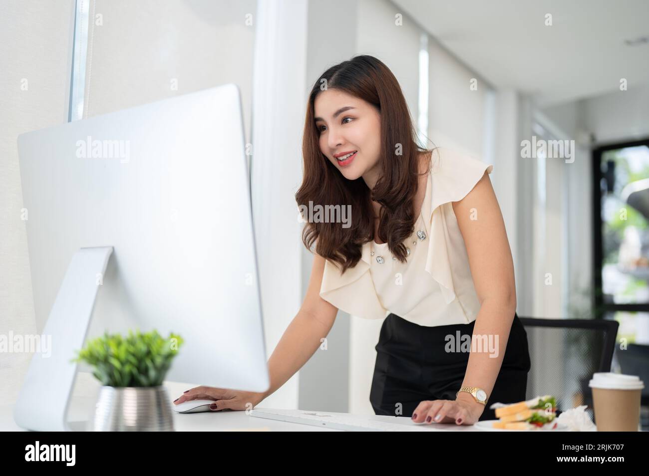 Female bending over hi-res stock photography and images - Alamy