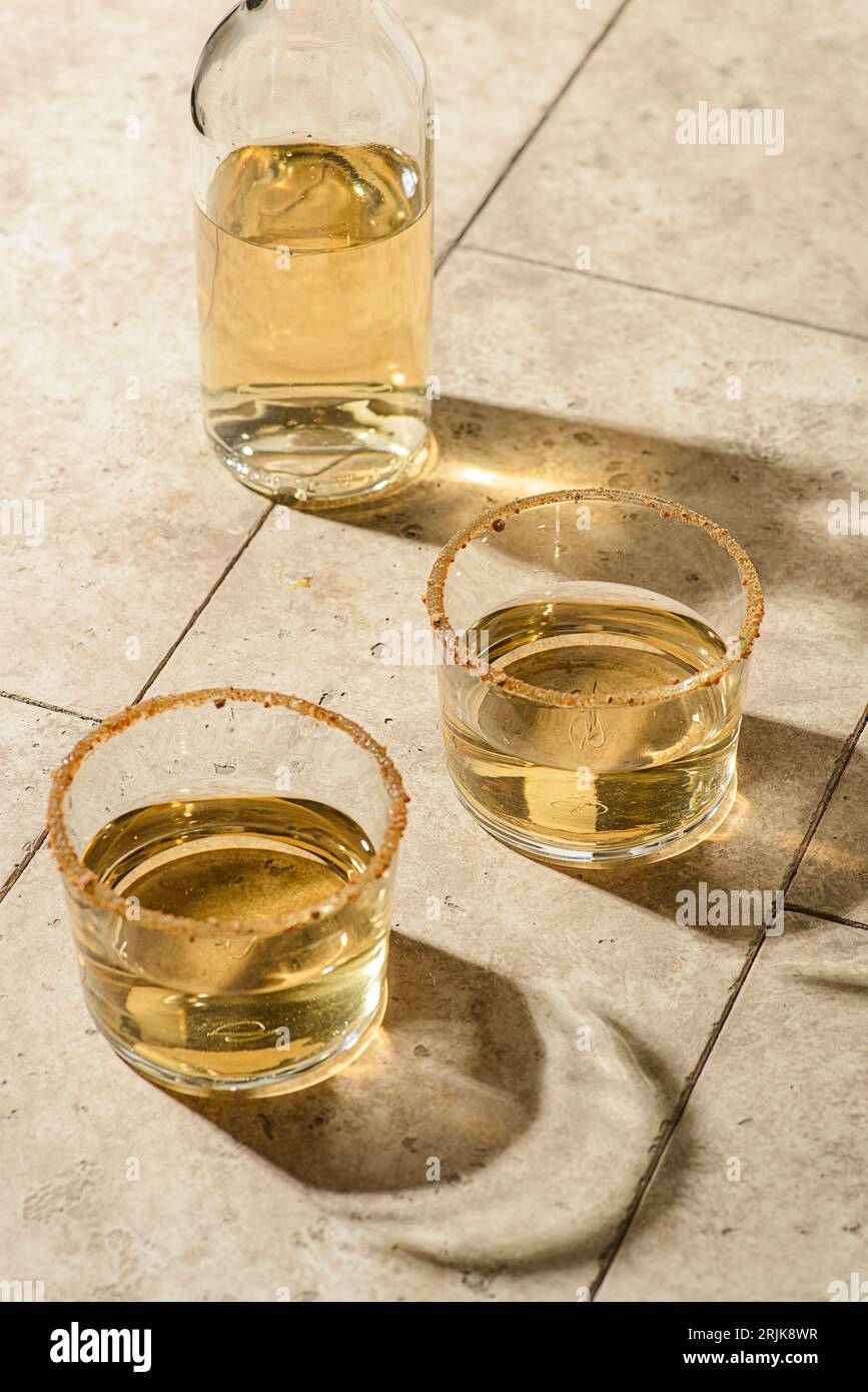 cocktail on beige background with shadows Stock Photo - Alamy