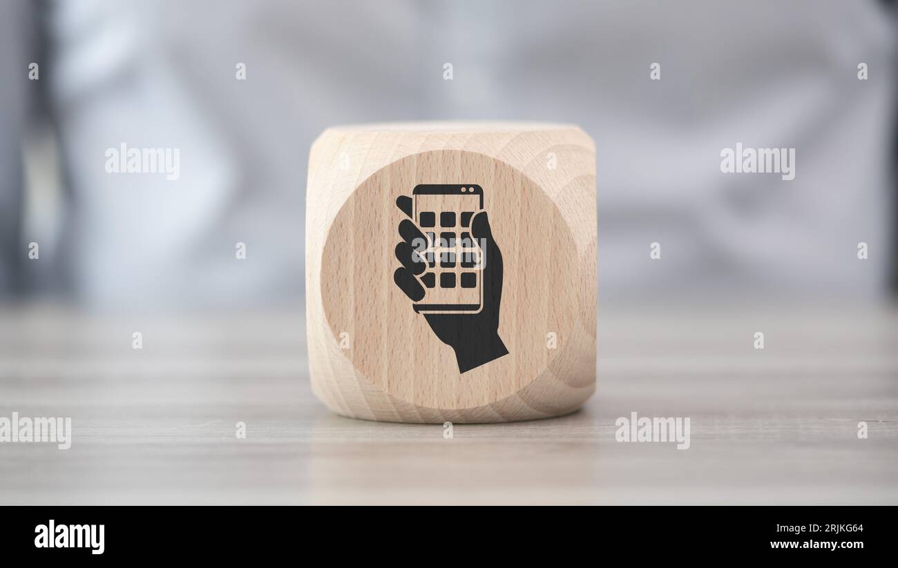 Wooden block with symbol of apps concept Stock Photo - Alamy