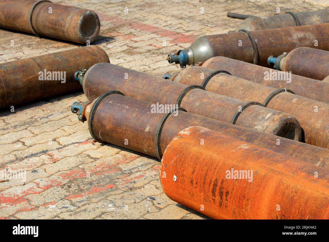 Oxidizing rusty oxygen bottles Stock Photo - Alamy