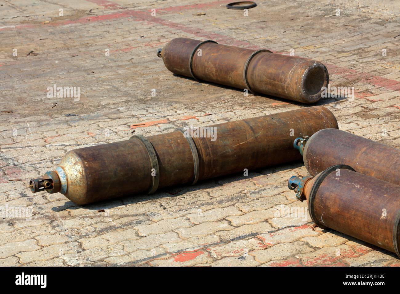 Oxidizing rusty oxygen bottles Stock Photo - Alamy