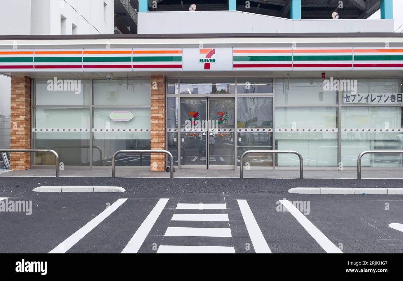 A storefront or exterior of a 7-Eleven convenience store that is ...