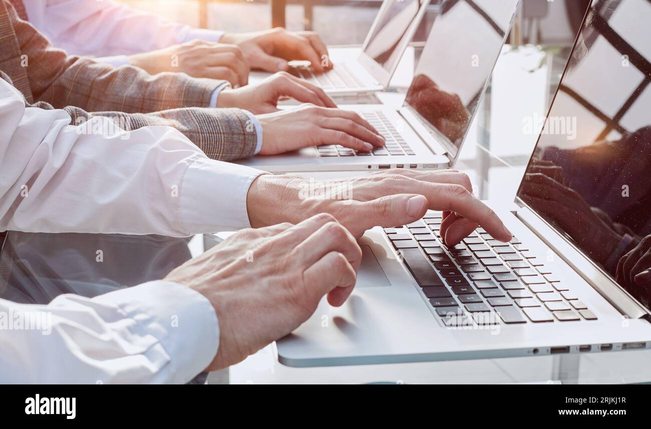man working at office hand on keyboard close up Stock Photo - Alamy