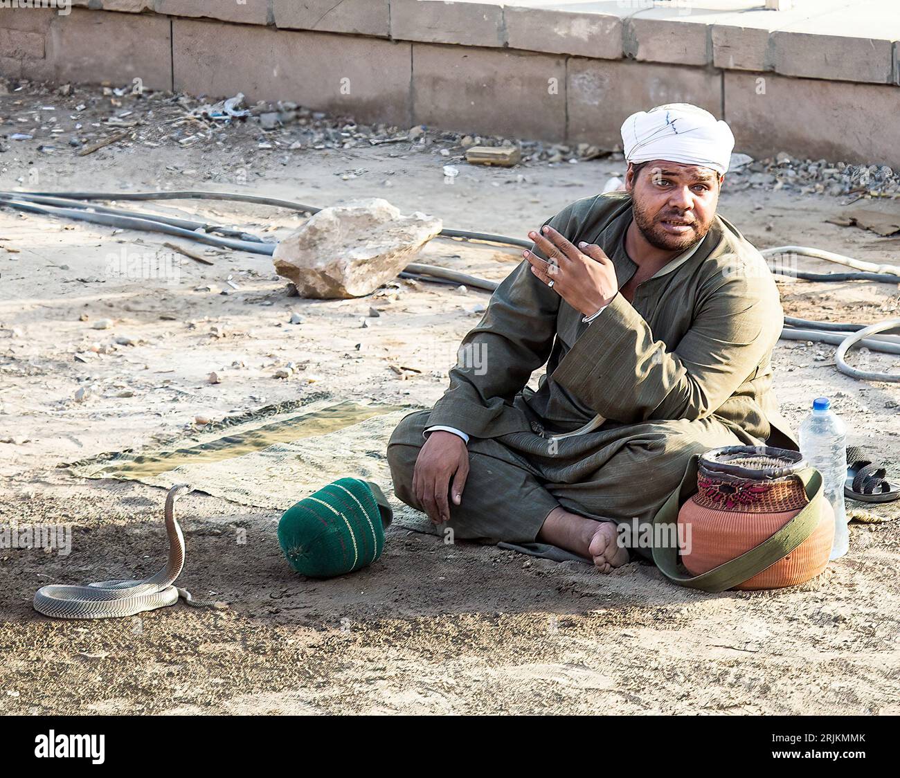 A man and his snake Stock Photo - Alamy