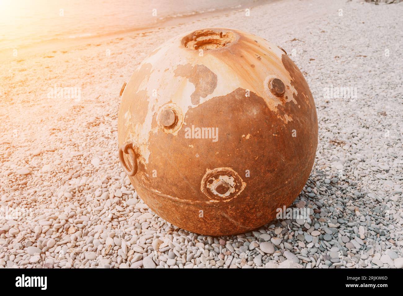 Old rusty sea mine on the beach Stock Photo - Alamy