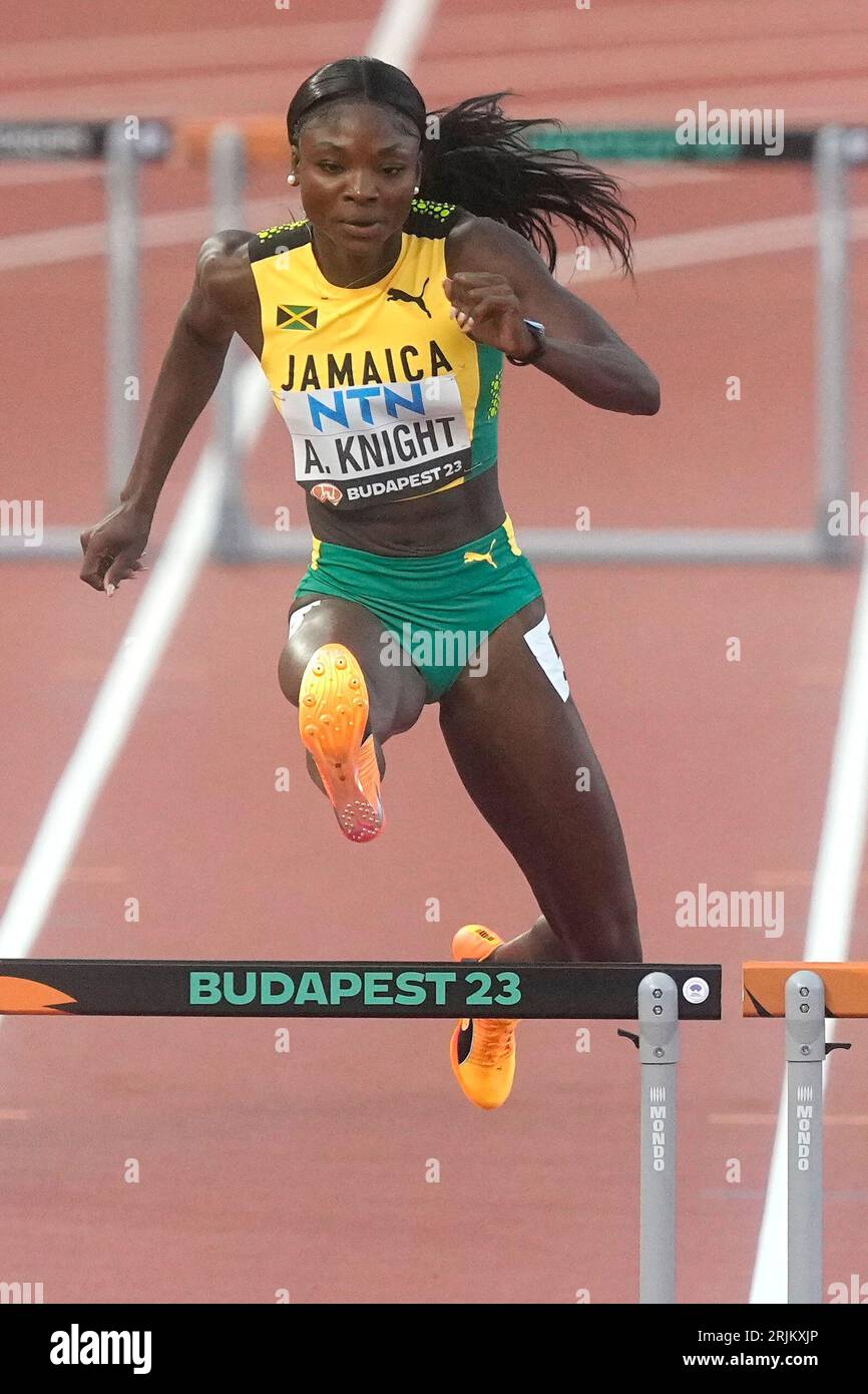 Andrenette Knight, of Jamaica, competes in a Women's 400-meters hurdles ...