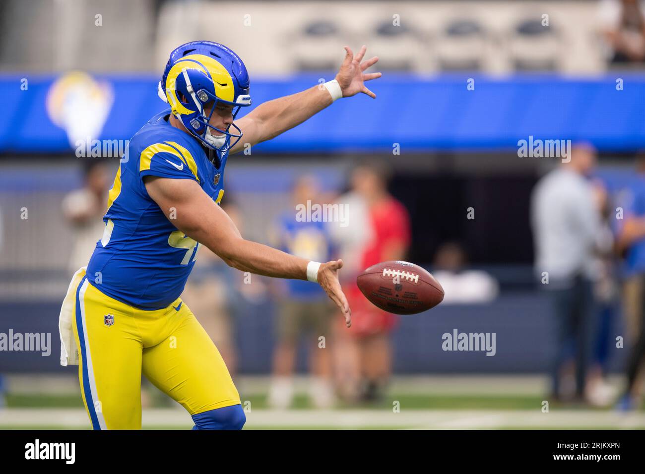Los Angeles Rams punter Ethan Evans (42) punts before an NFL preseason ...