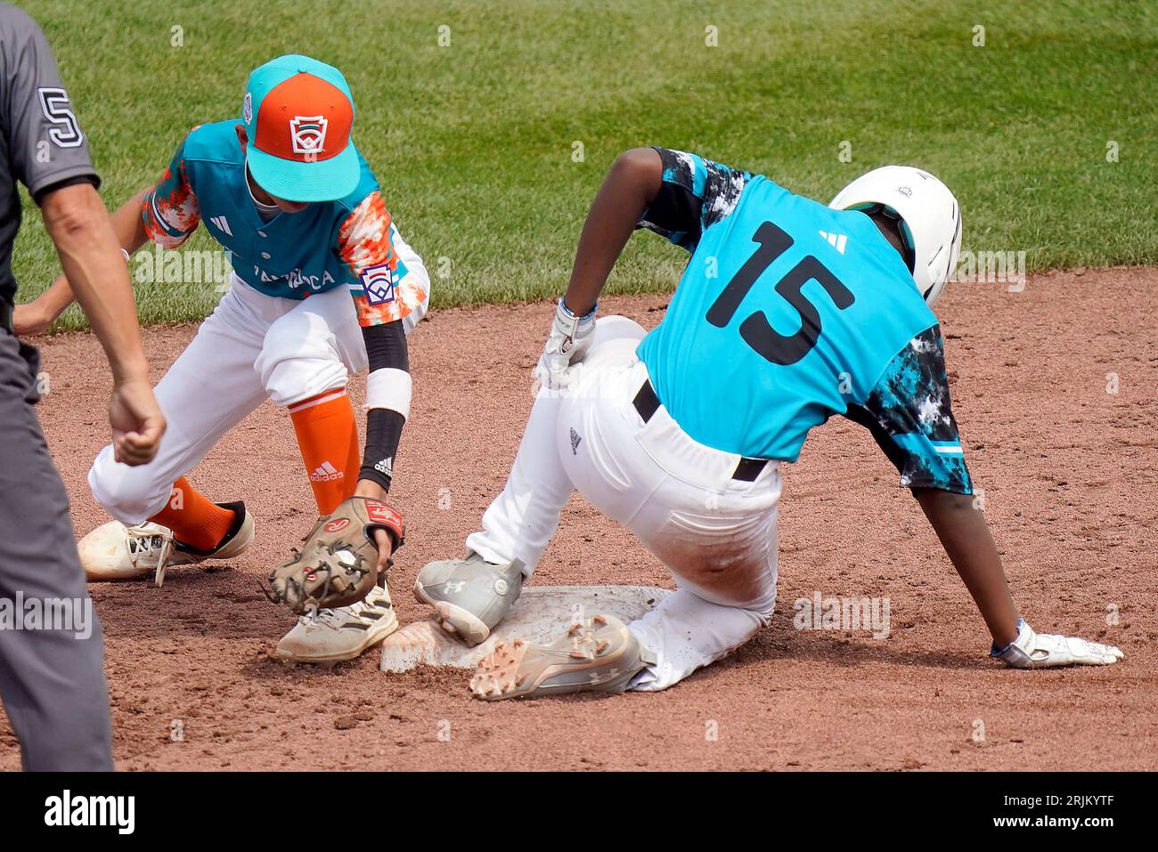 Curacao's Nathan Nahr (15) slides into second base with a double ahead ...