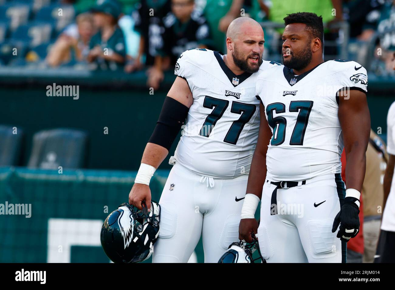 Philadelphia Eagles guard Julian Good-Jones (77) and center Cameron Tom ...