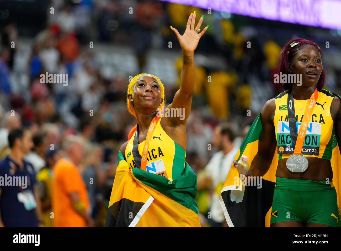 Shelly-Ann Fraser-Pryce, of Jamaica, left, and Shericka Jackson, of ...