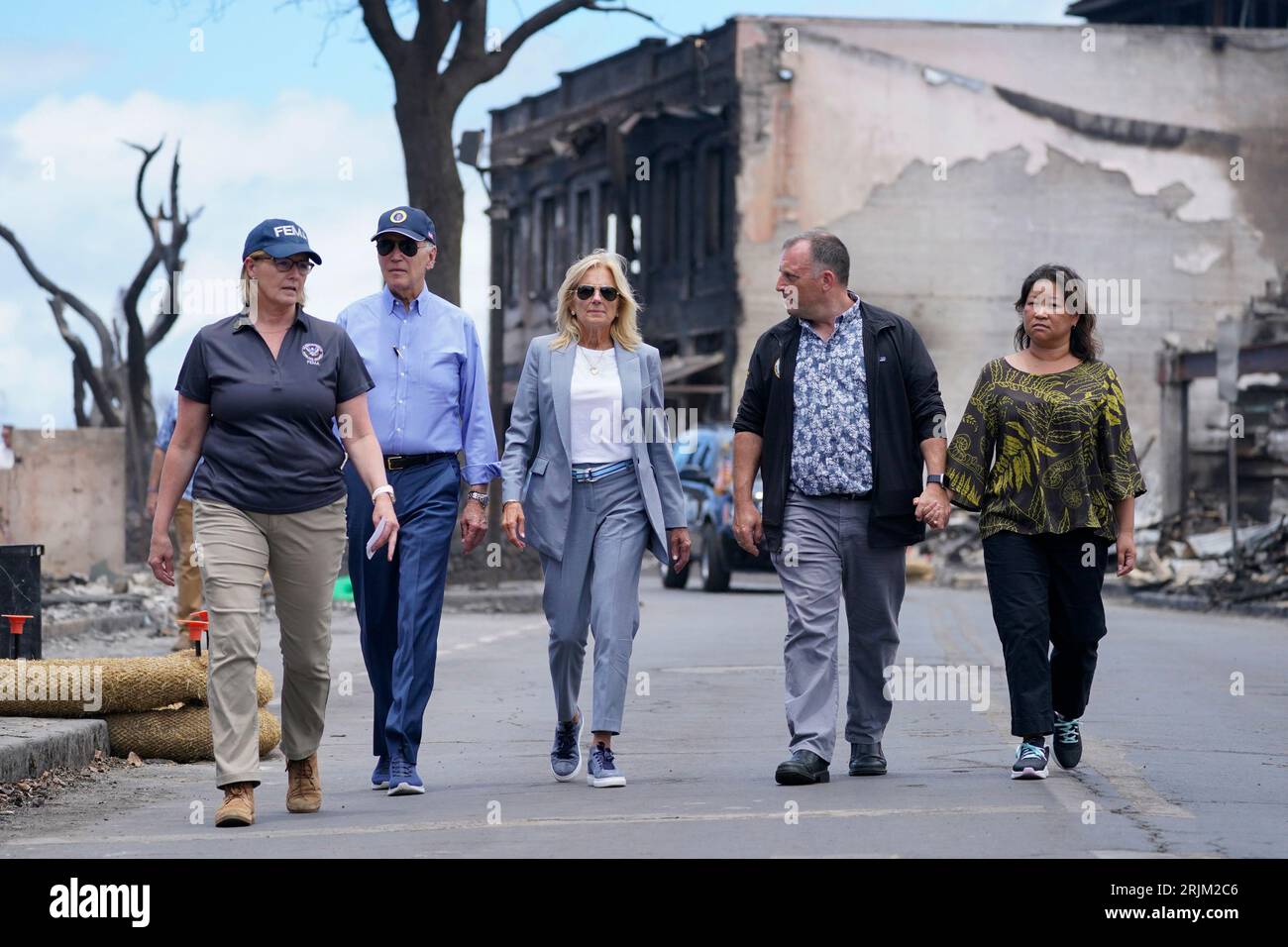 President Joe Biden and first lady Jill Biden walk with Hawaii Gov ...
