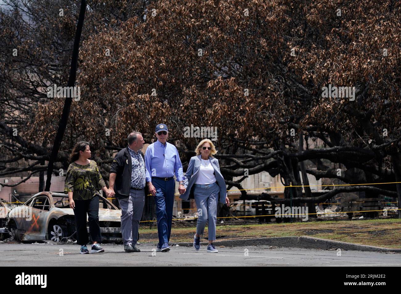 President Joe Biden and first lady Jill Biden walk with Hawaii Gov ...