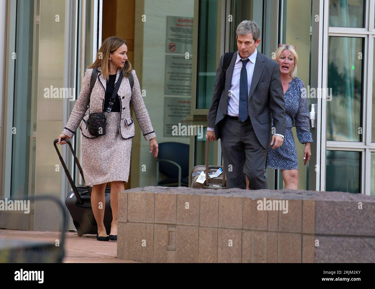 Margot Moss, left, and her co-counsel, David Oscar Markus, exit the ...