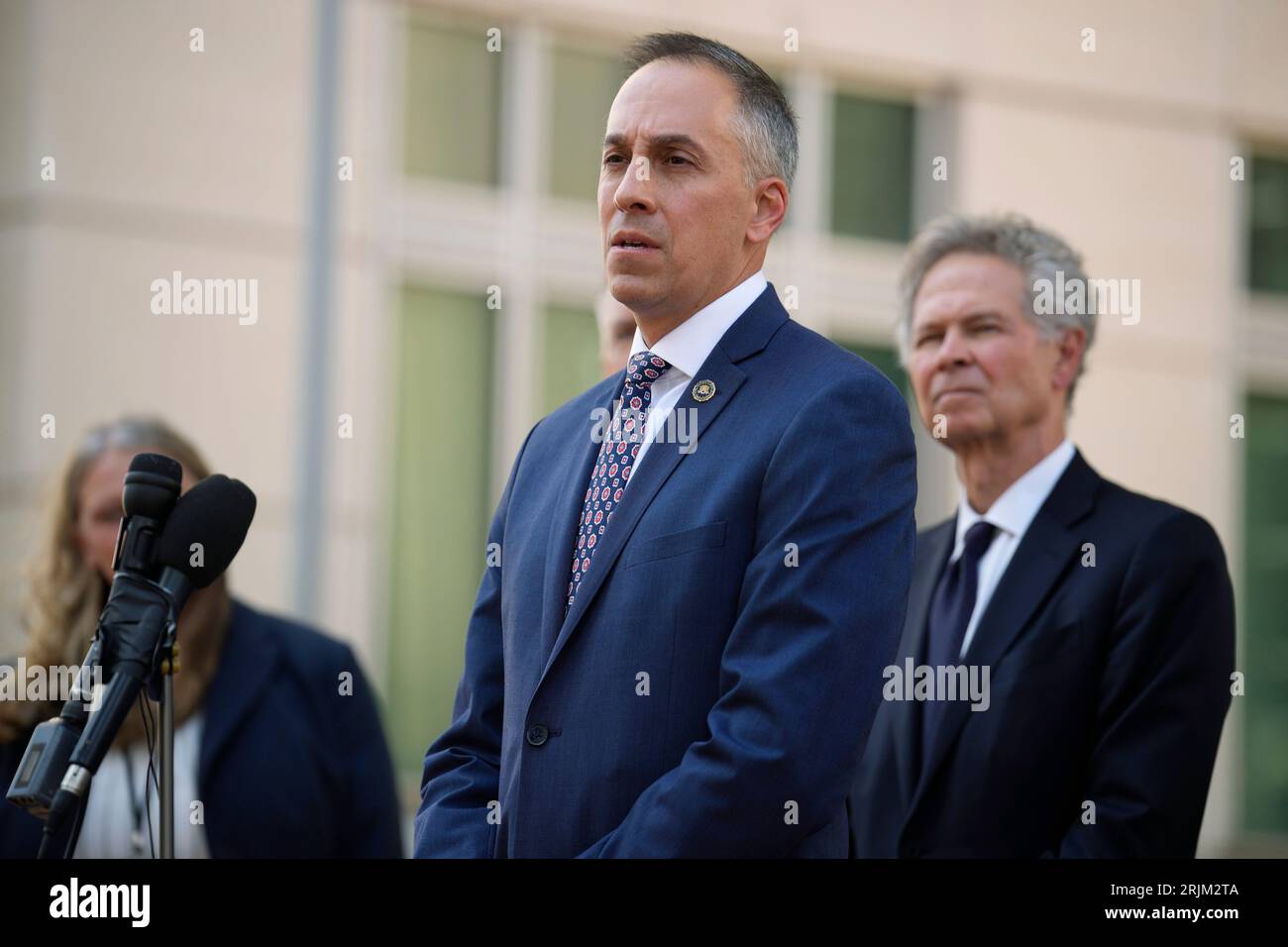 Mark Michalek, front, special agent in charge of the FBI's bureau in ...
