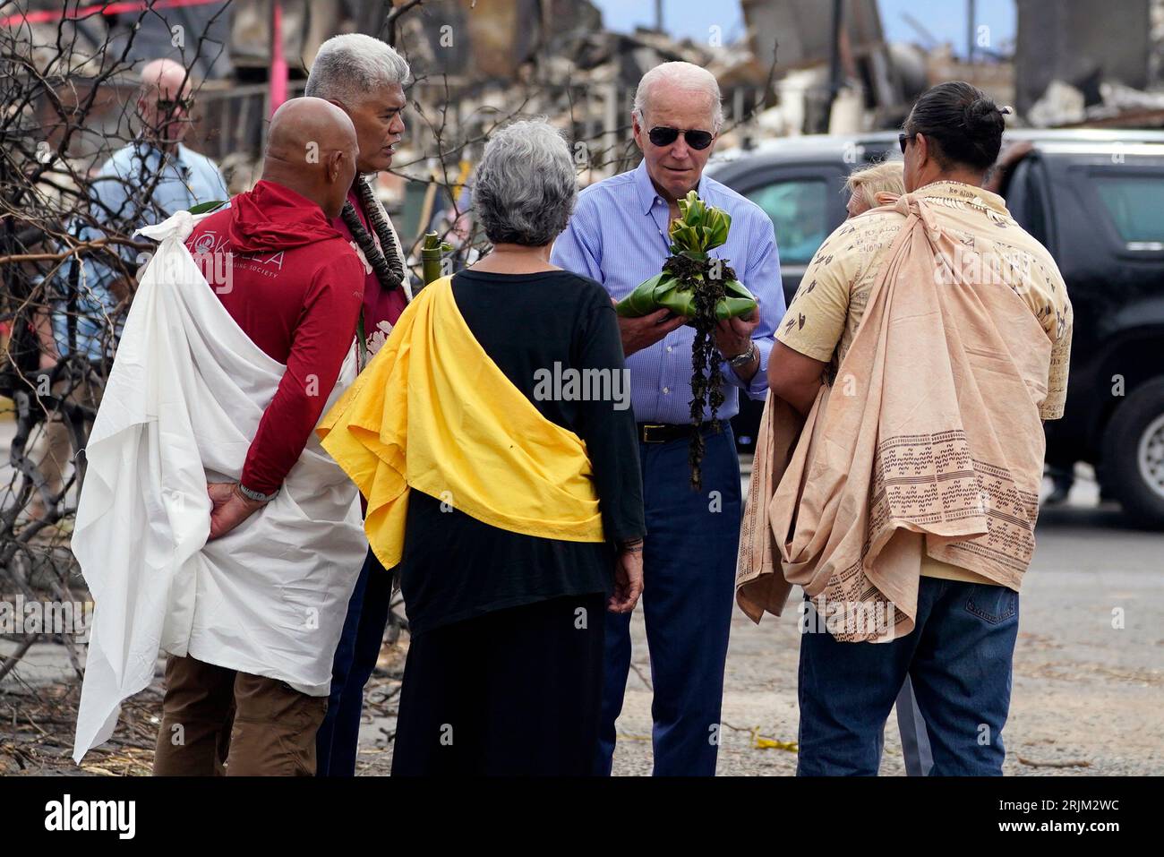 President Joe Biden and first lady Jill Biden participate in a blessing ...